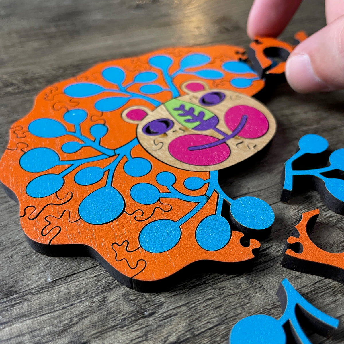 Toomuchery/Bumfuzzled Happy Lion – Puzzle Bomb